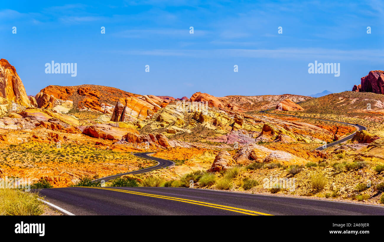 The colorful Aztec sandstone rock formations along the White Domes Road ...
