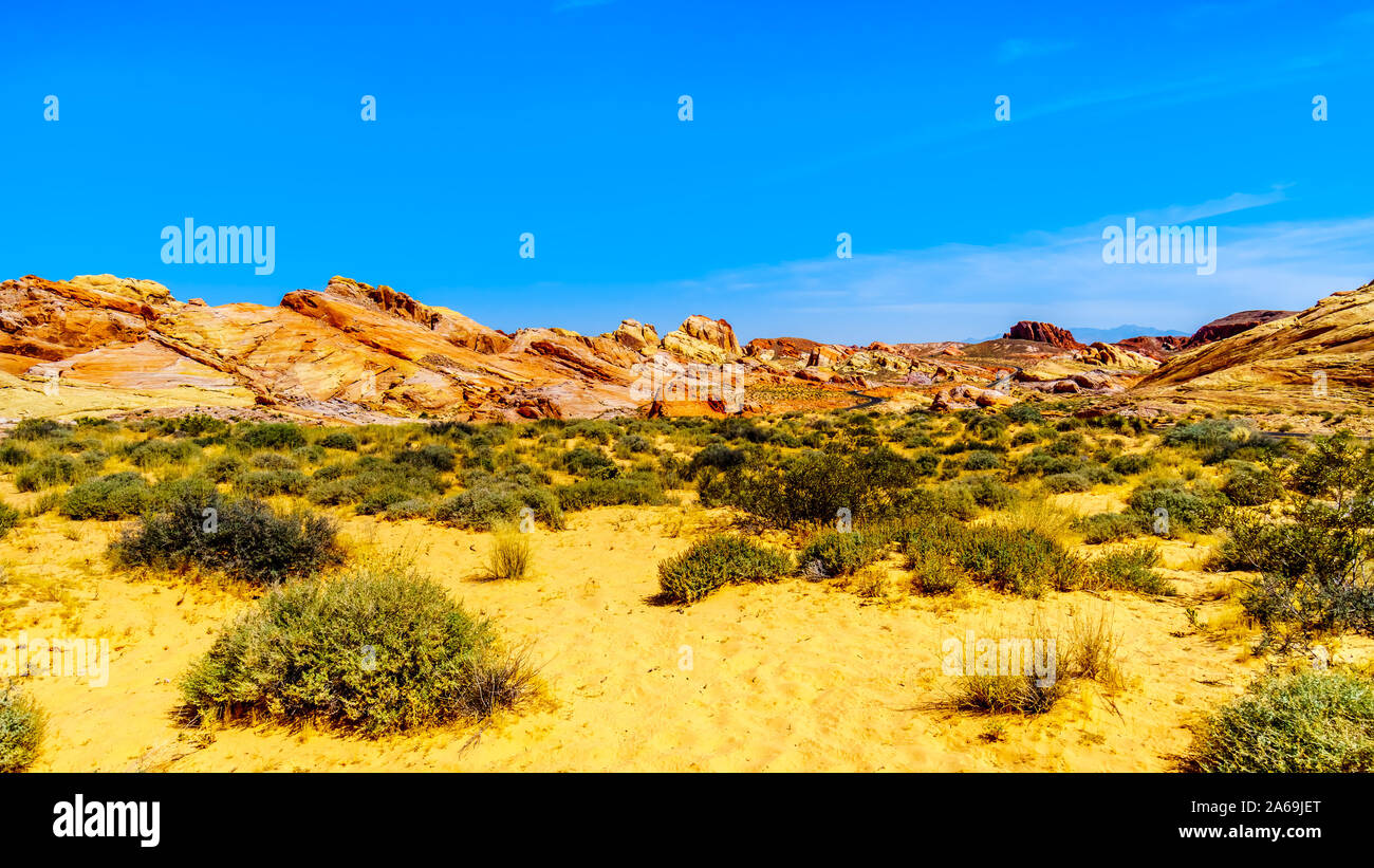The colorful red, yellow and white banded rock formations along the ...