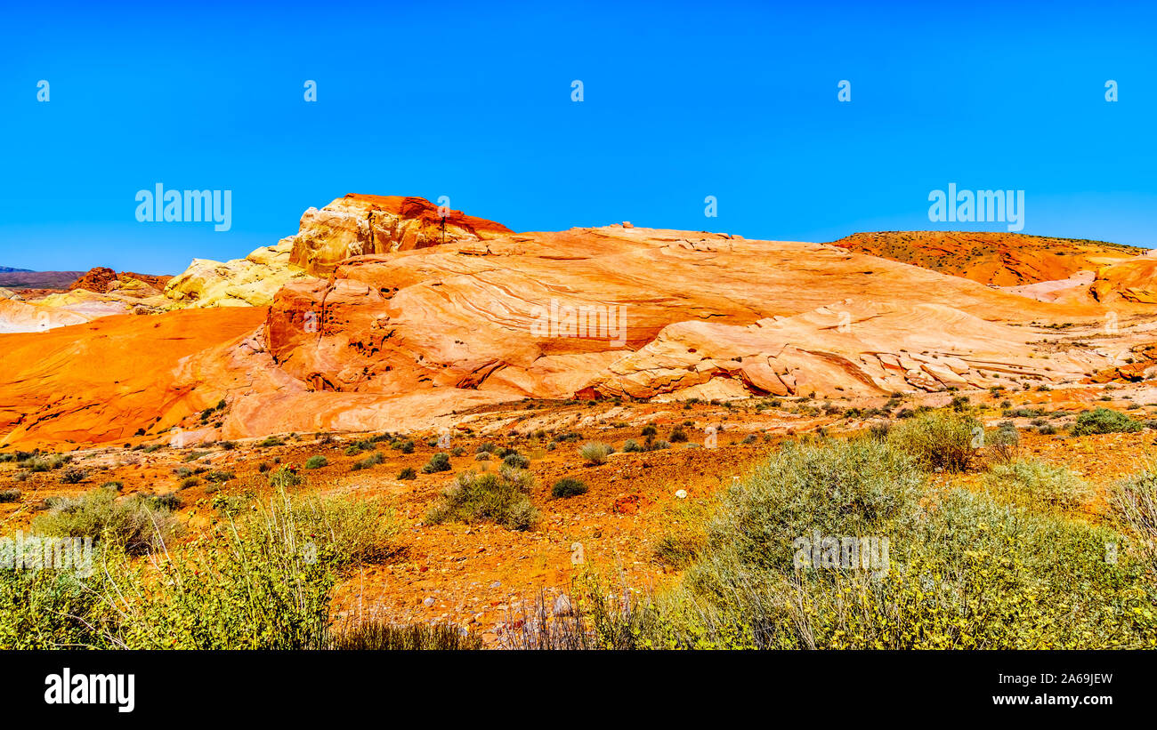 The colorful red, yellow and white banded rock formations along the ...