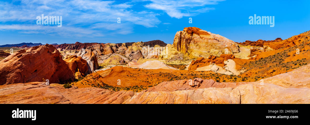 Panorama view of the colorful red, yellow and white banded rock ...