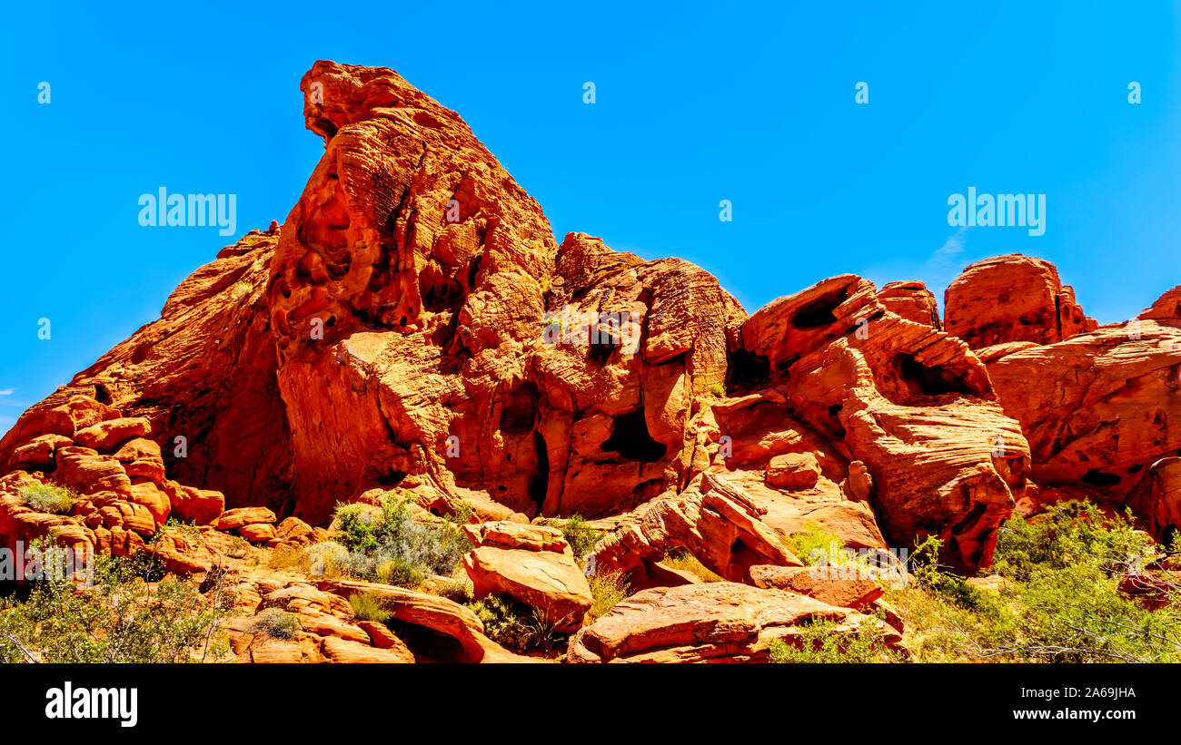 The erratic red Aztec Sandstone formation near the Arch Rock Campground ...
