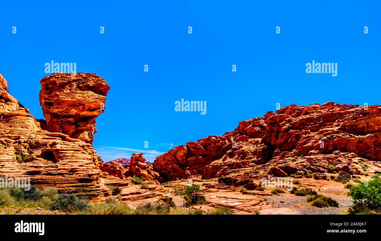 The erratic red Aztec Sandstone formation near the Arch Rock Campground ...