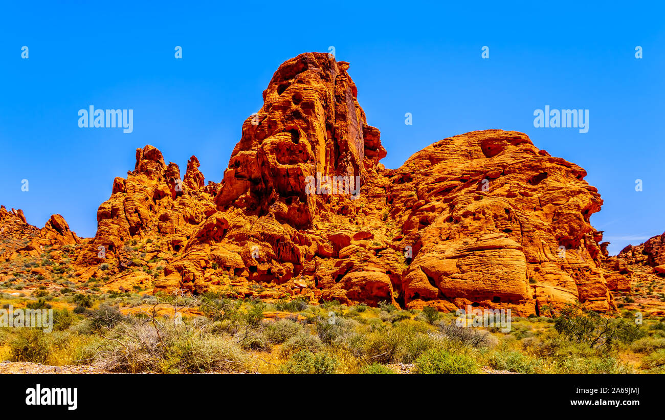 The erratic red Aztec Sandstone formation near the Arch Rock Campground ...
