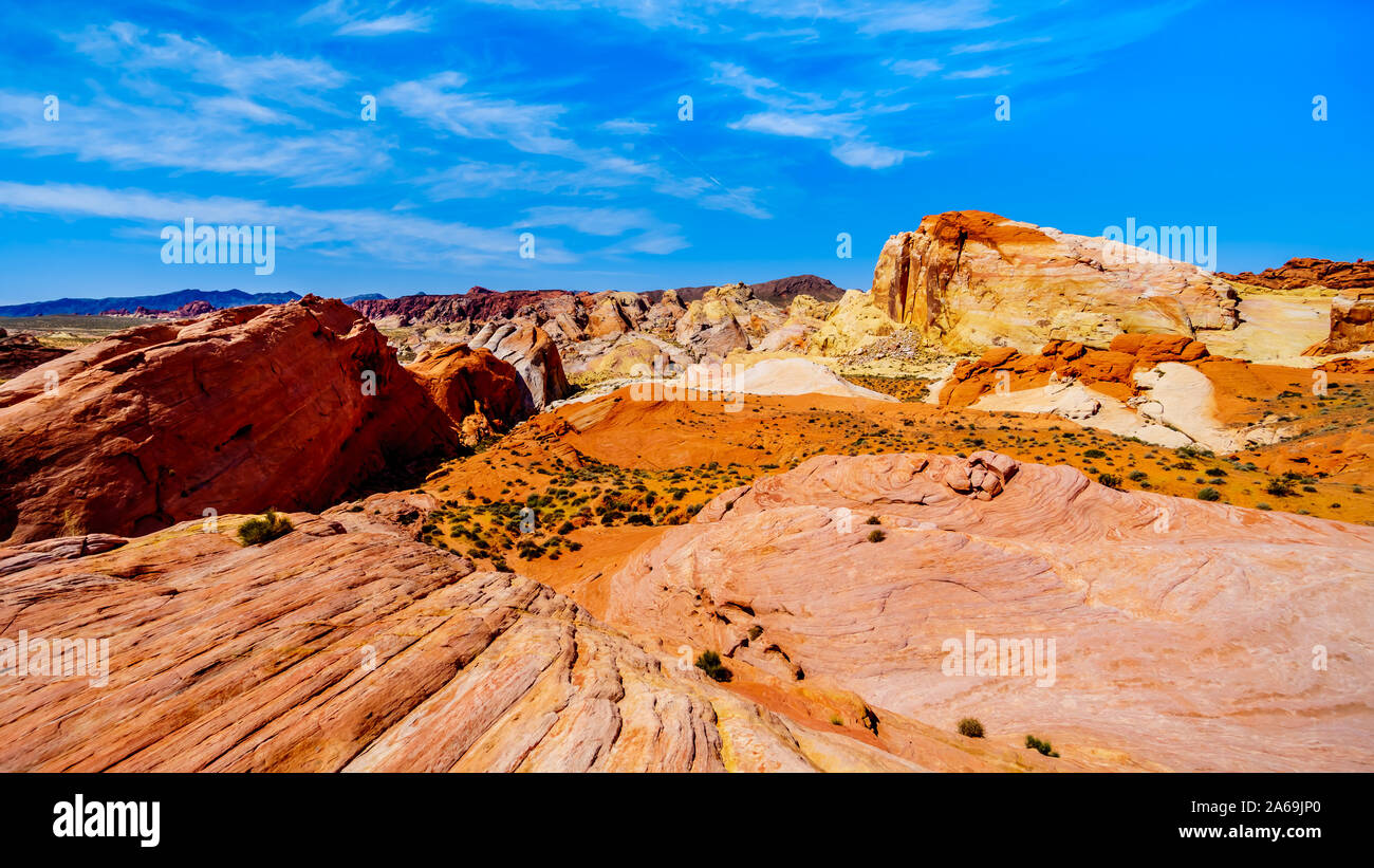 The colorful red, yellow and white banded rock formations along the ...