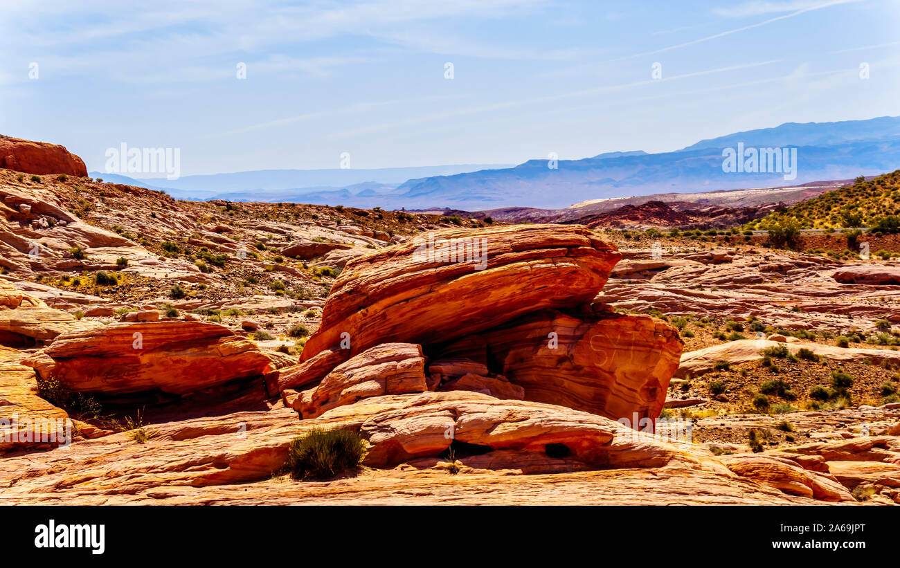 The colorful red, yellow and white banded rock formations along the ...