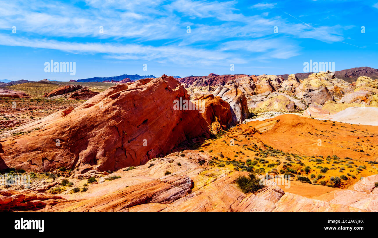 The colorful red, yellow and white banded rock formations along the ...