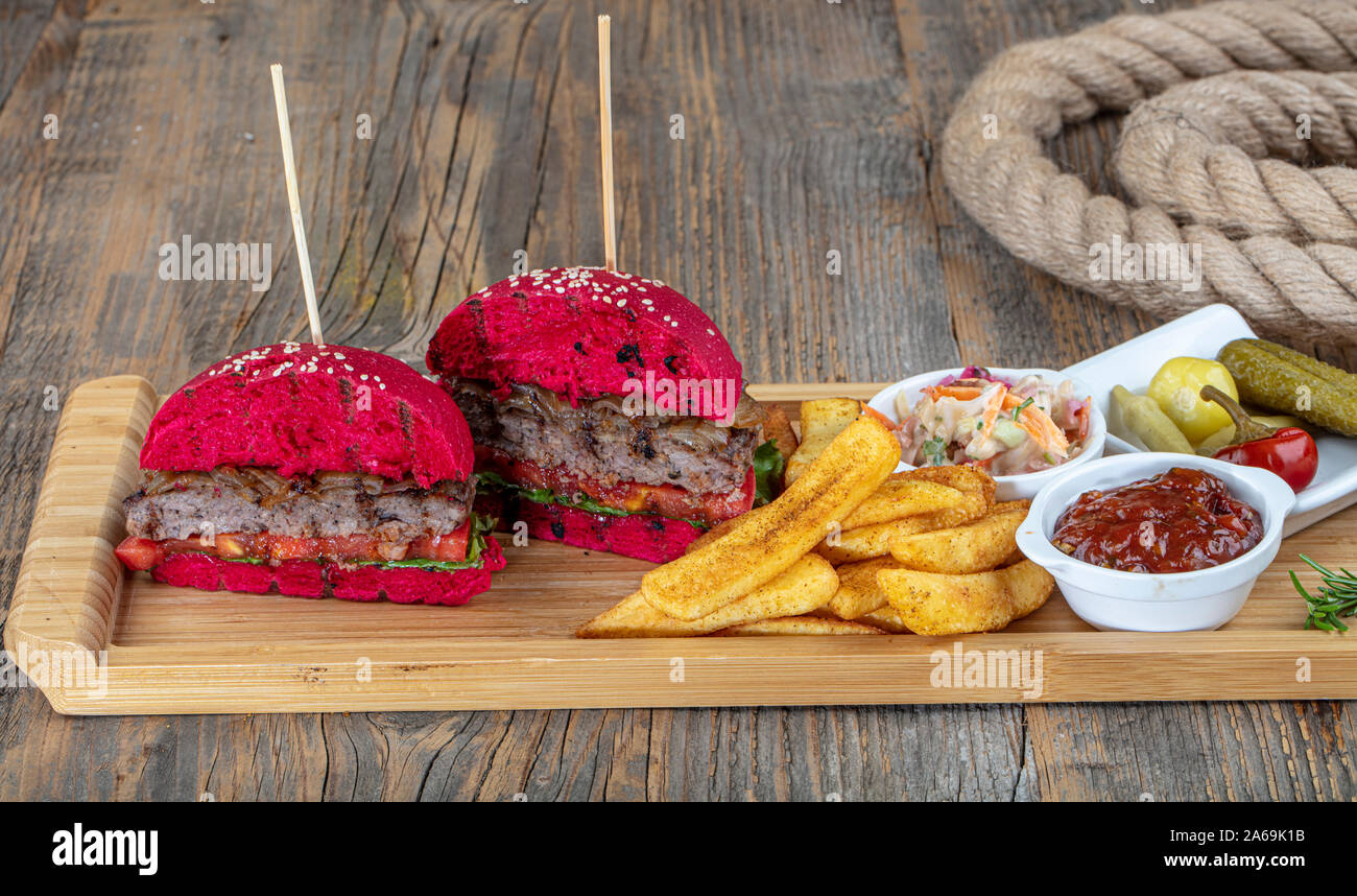 Red bread, burgers. American beefsteak burgers hamburgers pickles ...