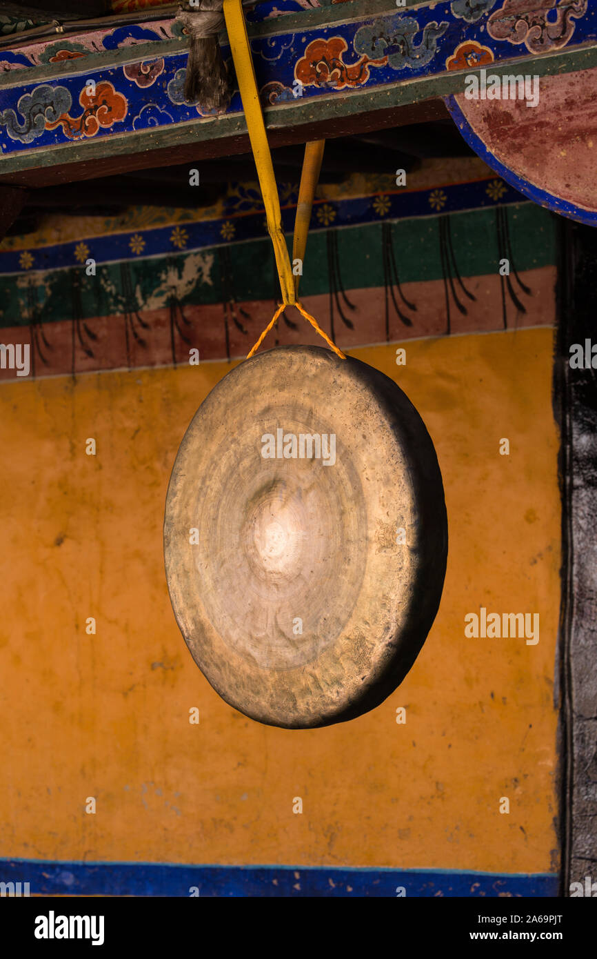 A gong hanging at the Jokhang Temple in Lhasa, Tibet. It is the most ...