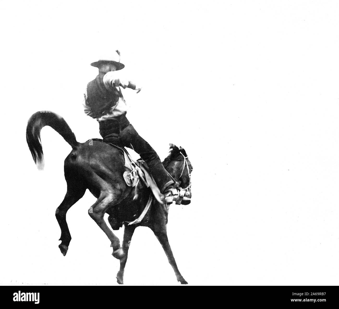 Cowboy on a bucking Bronco 1880s Stock Photo - Alamy