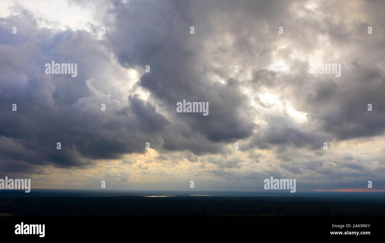Aerial image of dark Storm clouds over the land. Aerial panorama of ...
