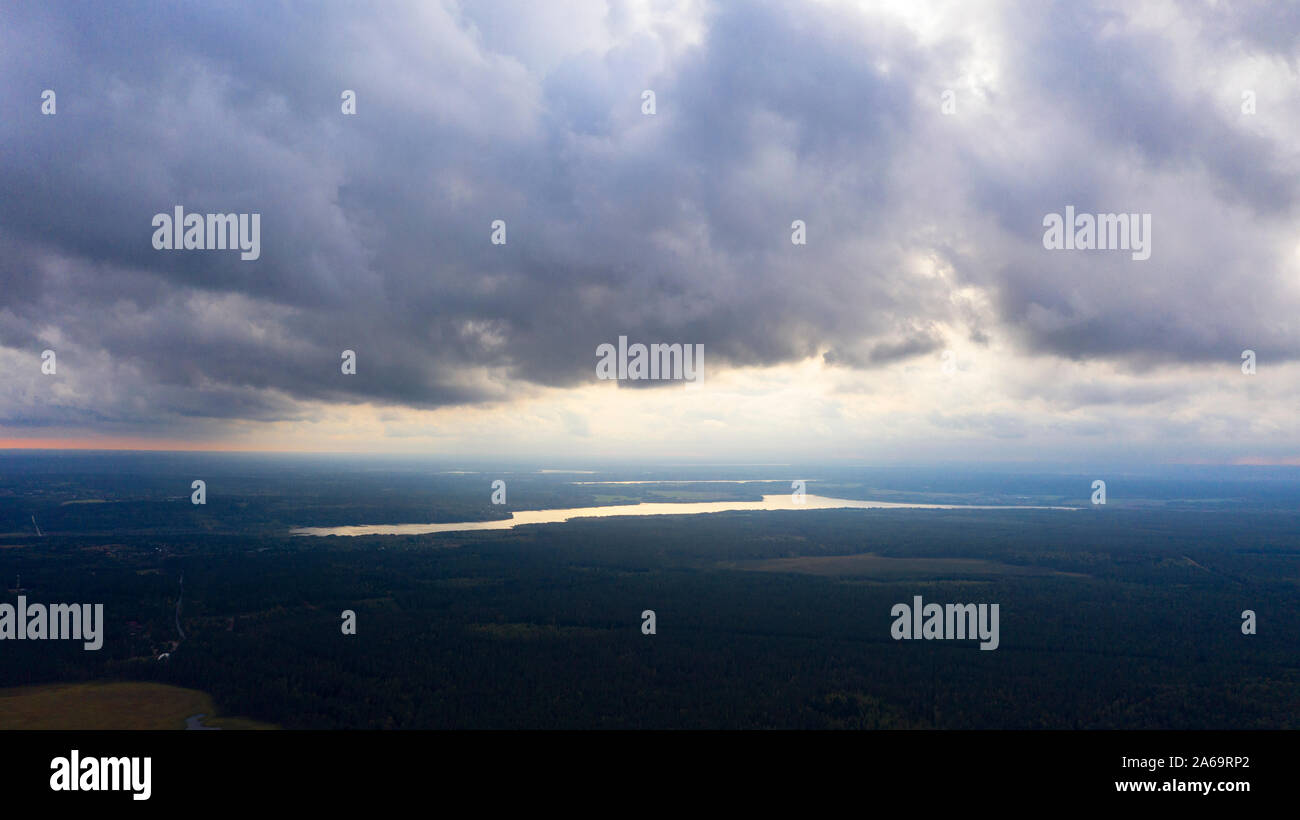 Aerial image of dark Storm clouds over the land. Aerial panorama of ...