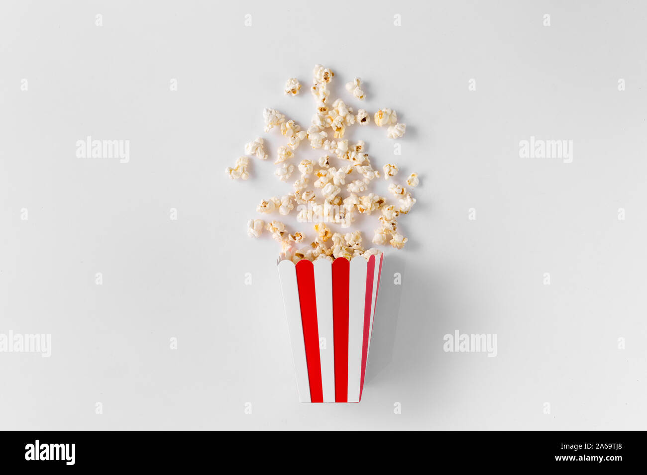 Box of popcorn isolated on white background top view Stock Photo - Alamy