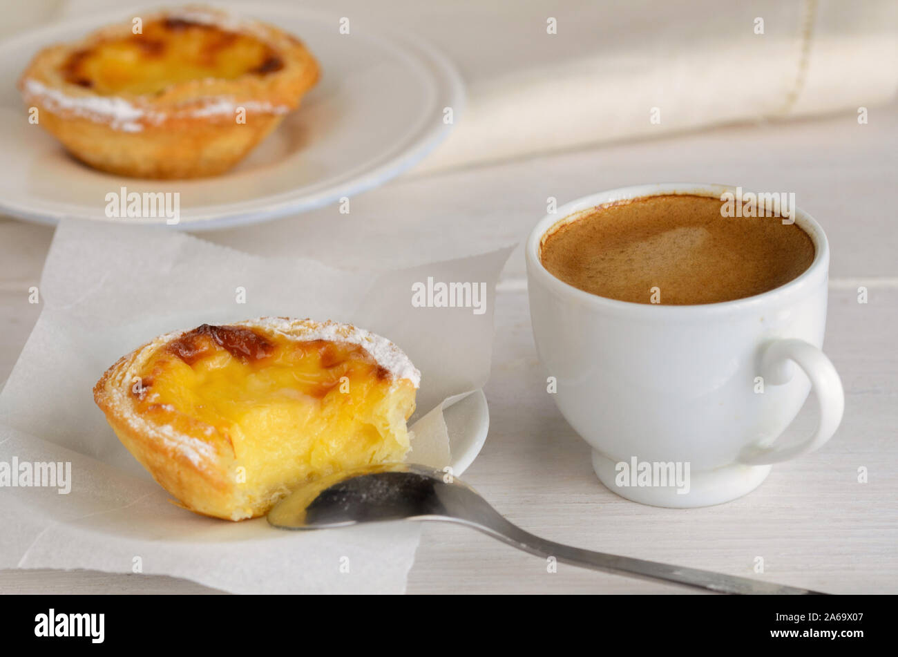 Pasteis de Belem, egg tart pastries with coffee at Lisbon cafe in ...