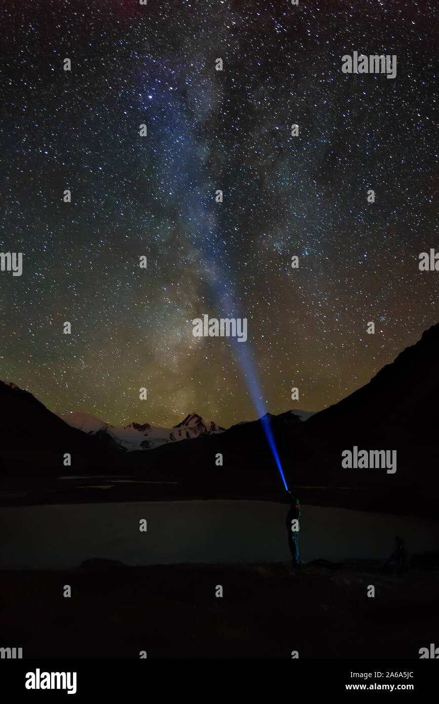 Colorful night autumn landscape with a starry sky, the Milky Way galaxy ...