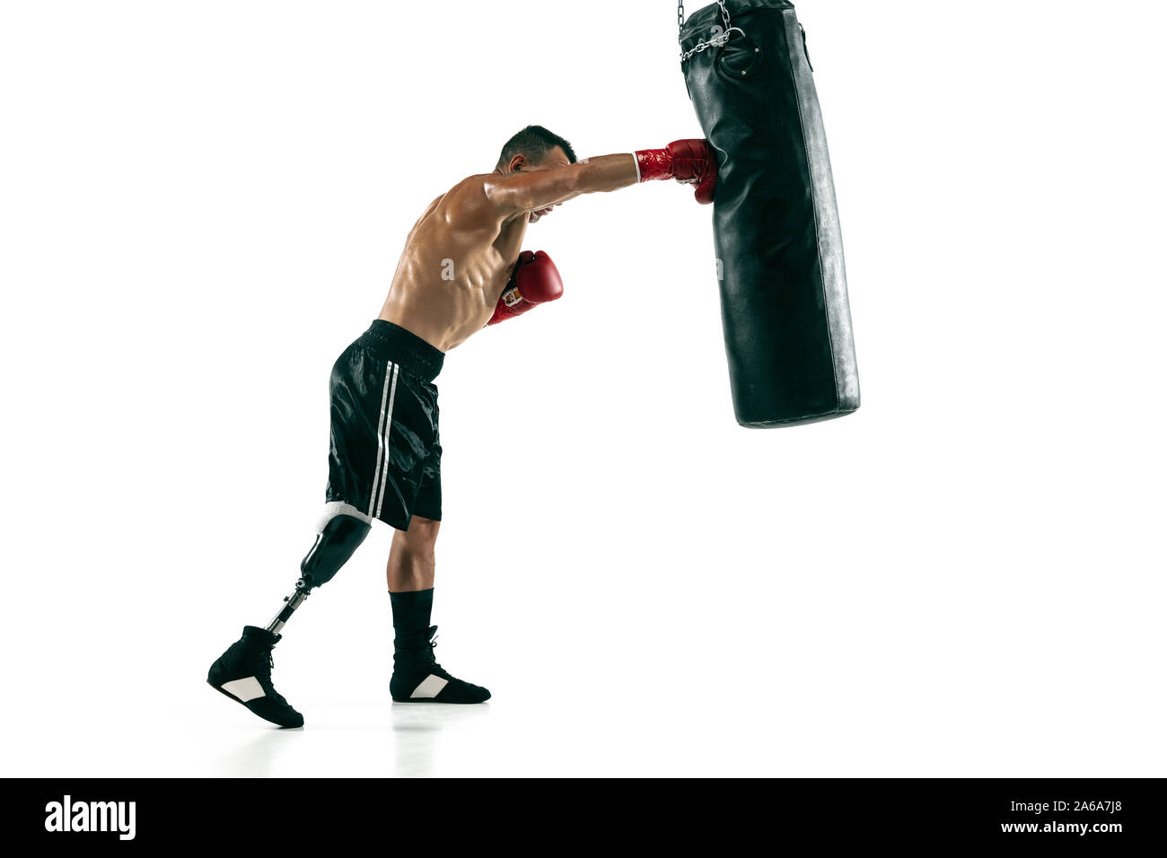 Full length portrait of muscular sportsman with prosthetic leg, copy ...