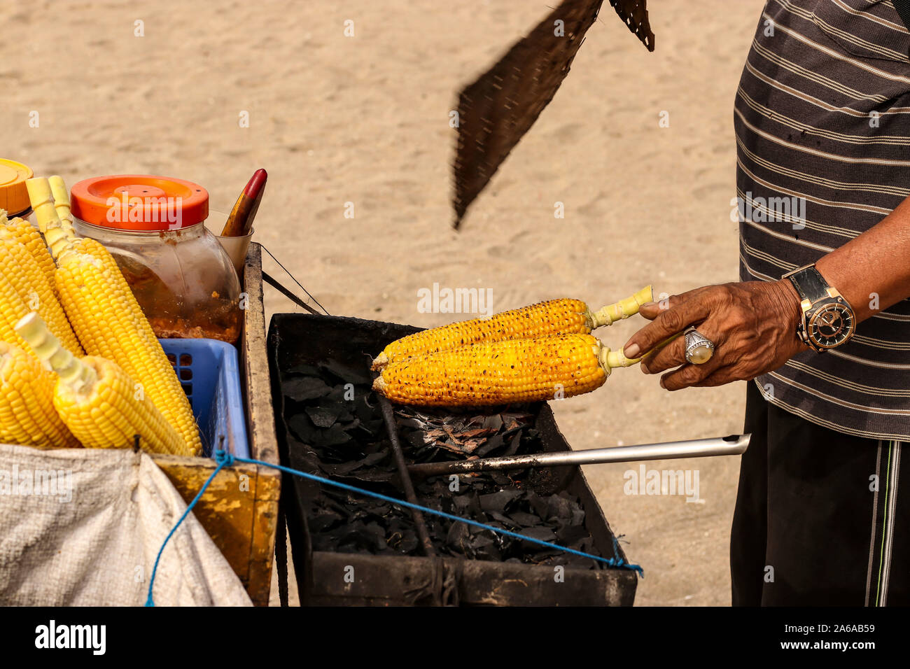 Baked corn sold on the beach in Bali island, Indonesia Stock Photo - Alamy
