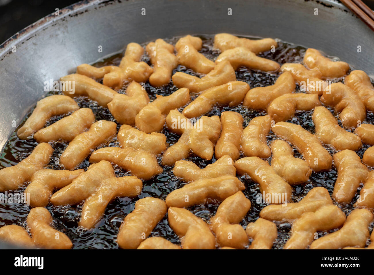 deep fried dough stick Stock Photo - Alamy