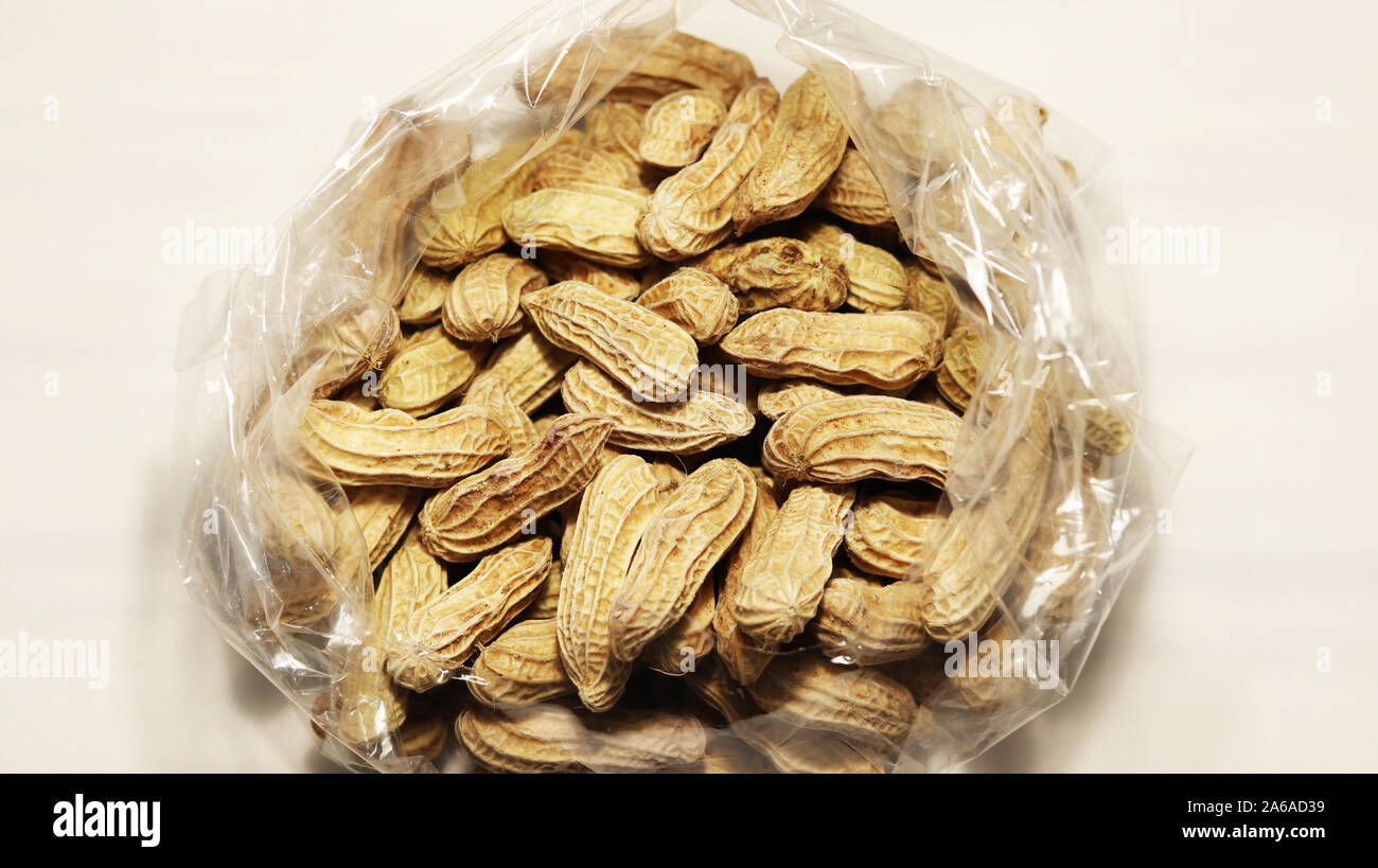 Peanuts in plastic bag Stock Photo - Alamy