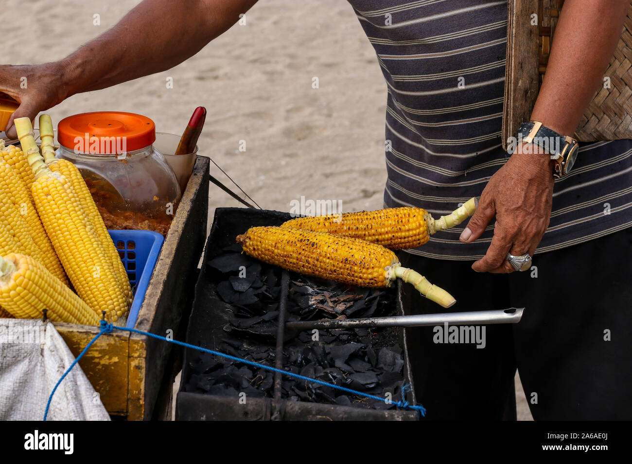 Baked corn sold on the beach in Bali island, Indonesia Stock Photo - Alamy