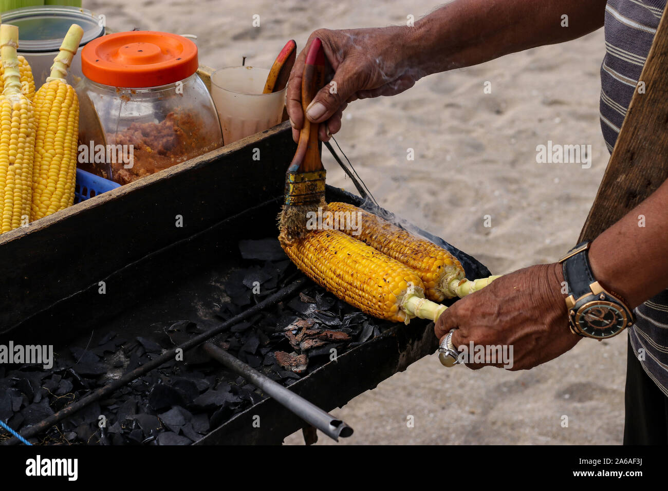 Baked corn sold on the beach in Bali island, Indonesia Stock Photo - Alamy