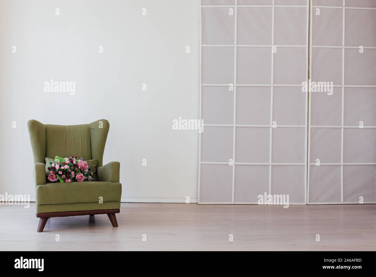 Green vintage rest chair in the interior of the house room Stock Photo ...