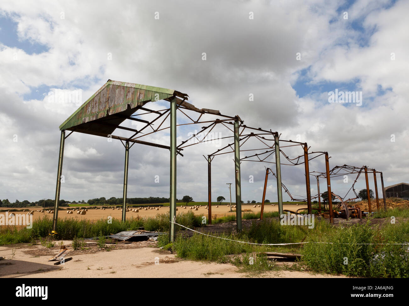 A fire damaged Dutch Barn Stock Photo - Alamy