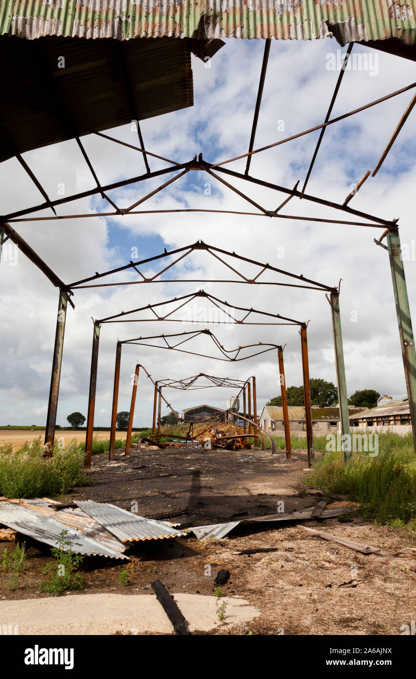 A fire damaged Dutch Barn Stock Photo - Alamy