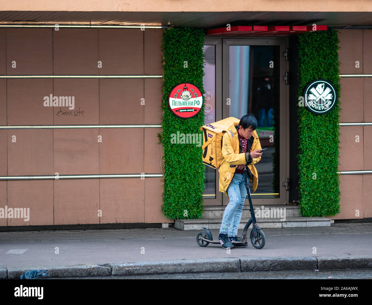 Moscow, Russia - October 19, 2019: Asian young man, a Yandex-Eda ...