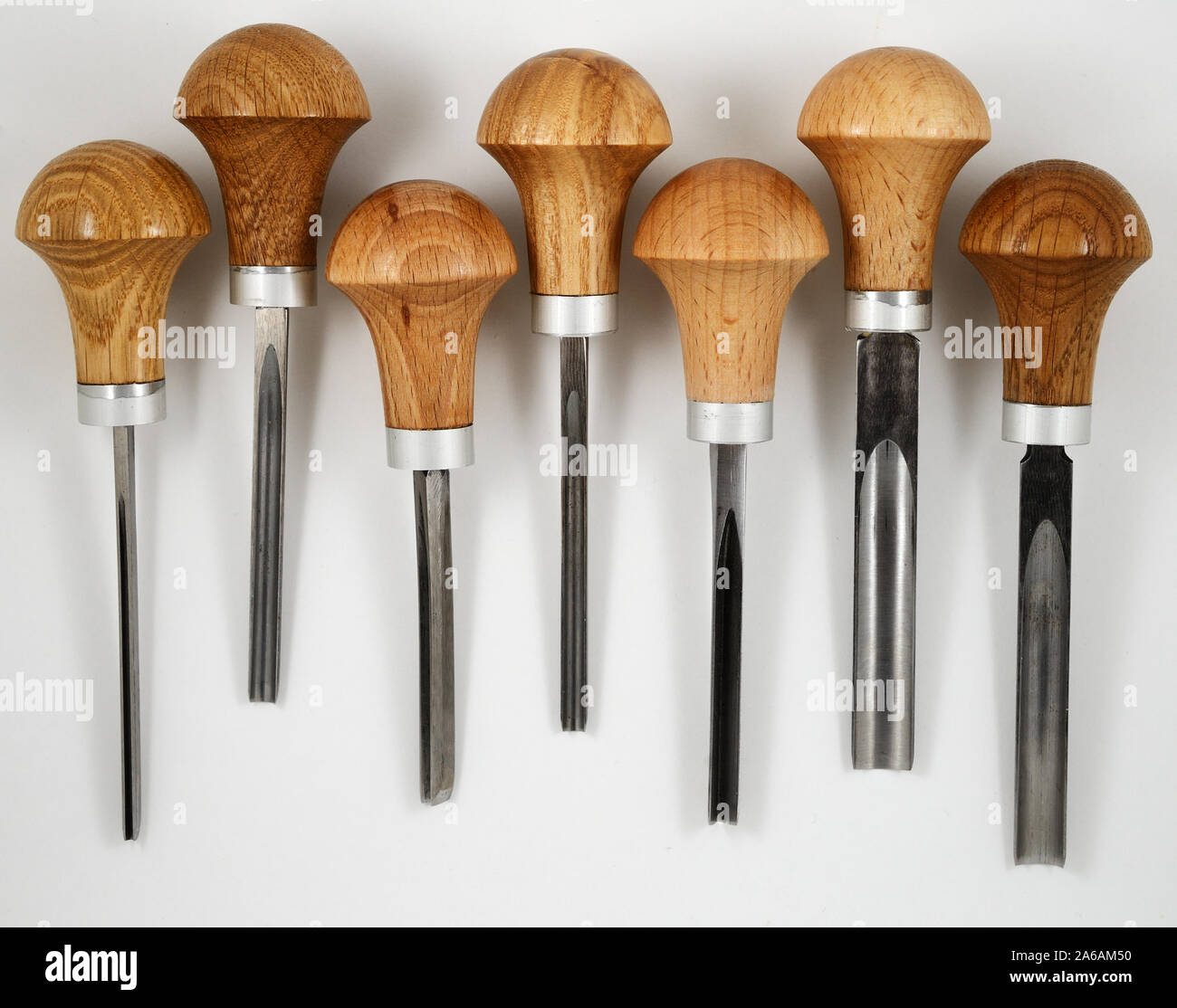 seven wood carving tools on white background Stock Photo - Alamy