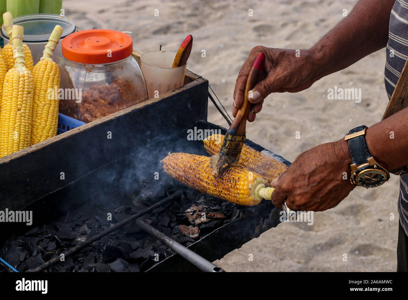 Baked corn sold on the beach in Bali island, Indonesia Stock Photo - Alamy