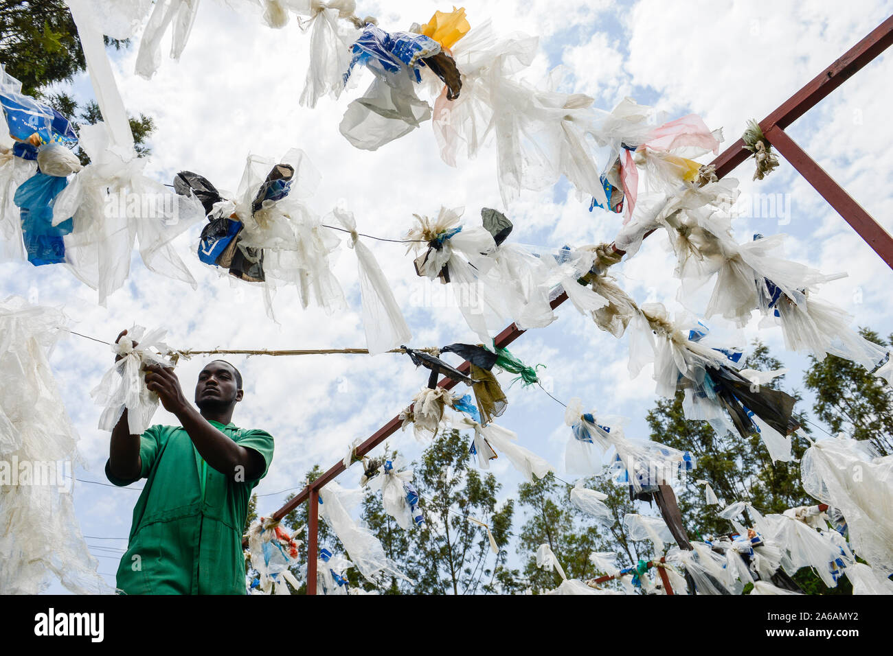 RWANDA, Kigali, plastic recycling at company ecoplastics, worker clean ...