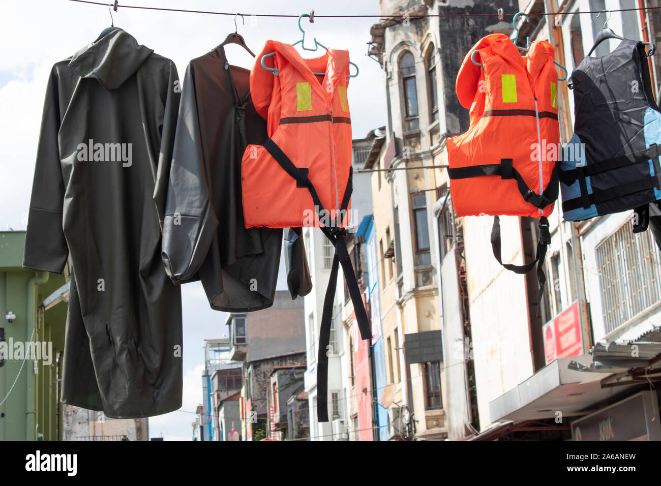 Rain coat hanging hi-res stock photography and images - Alamy