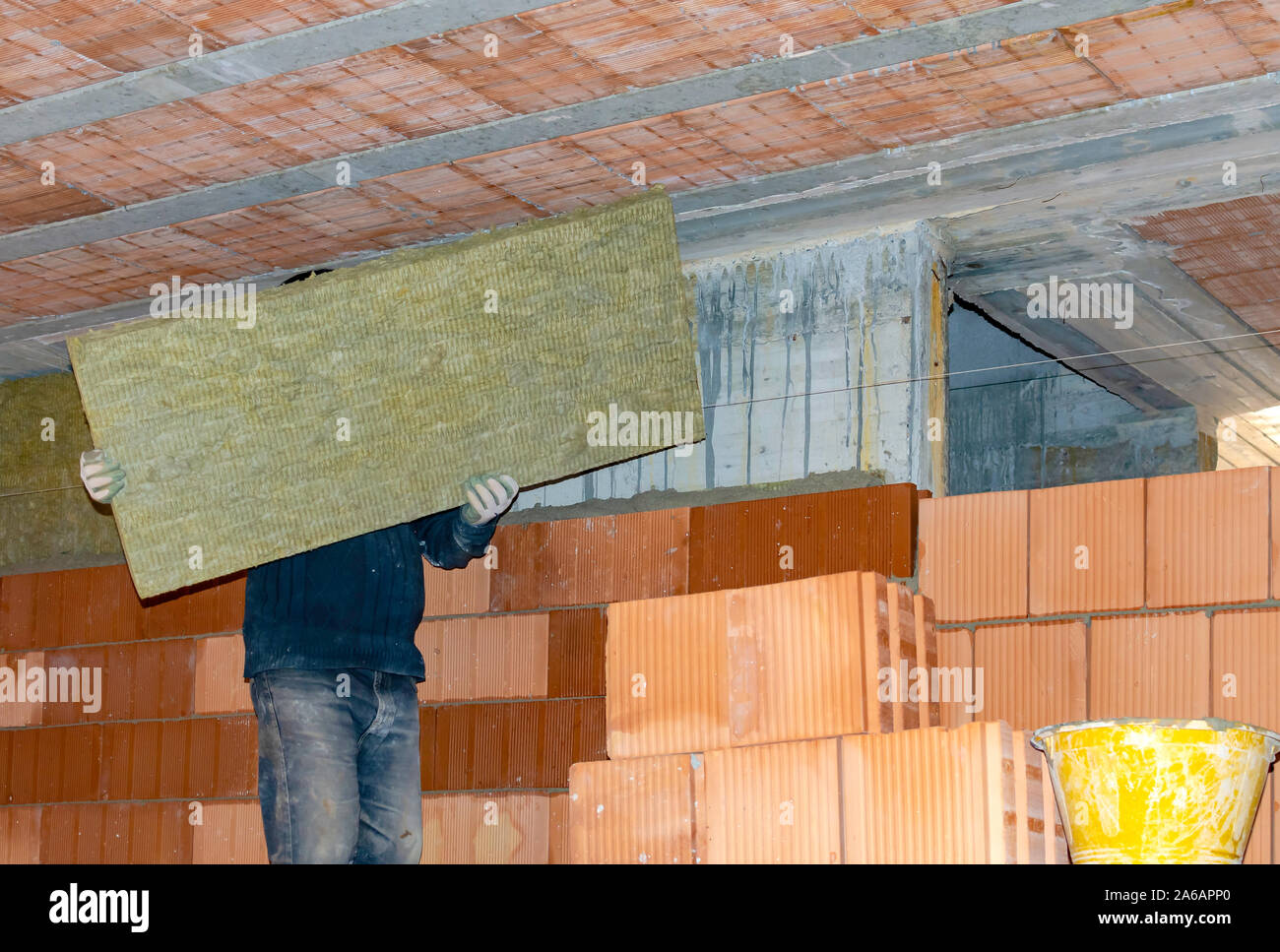 Construction of new brickwork with thermal brick blocks. In the cavity ...
