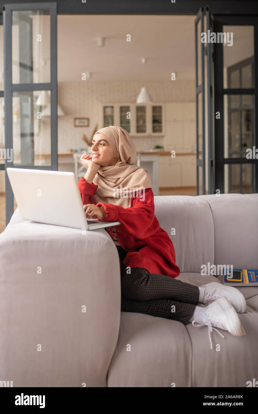 Muslim girl thinking about her future while having a break Stock Photo ...