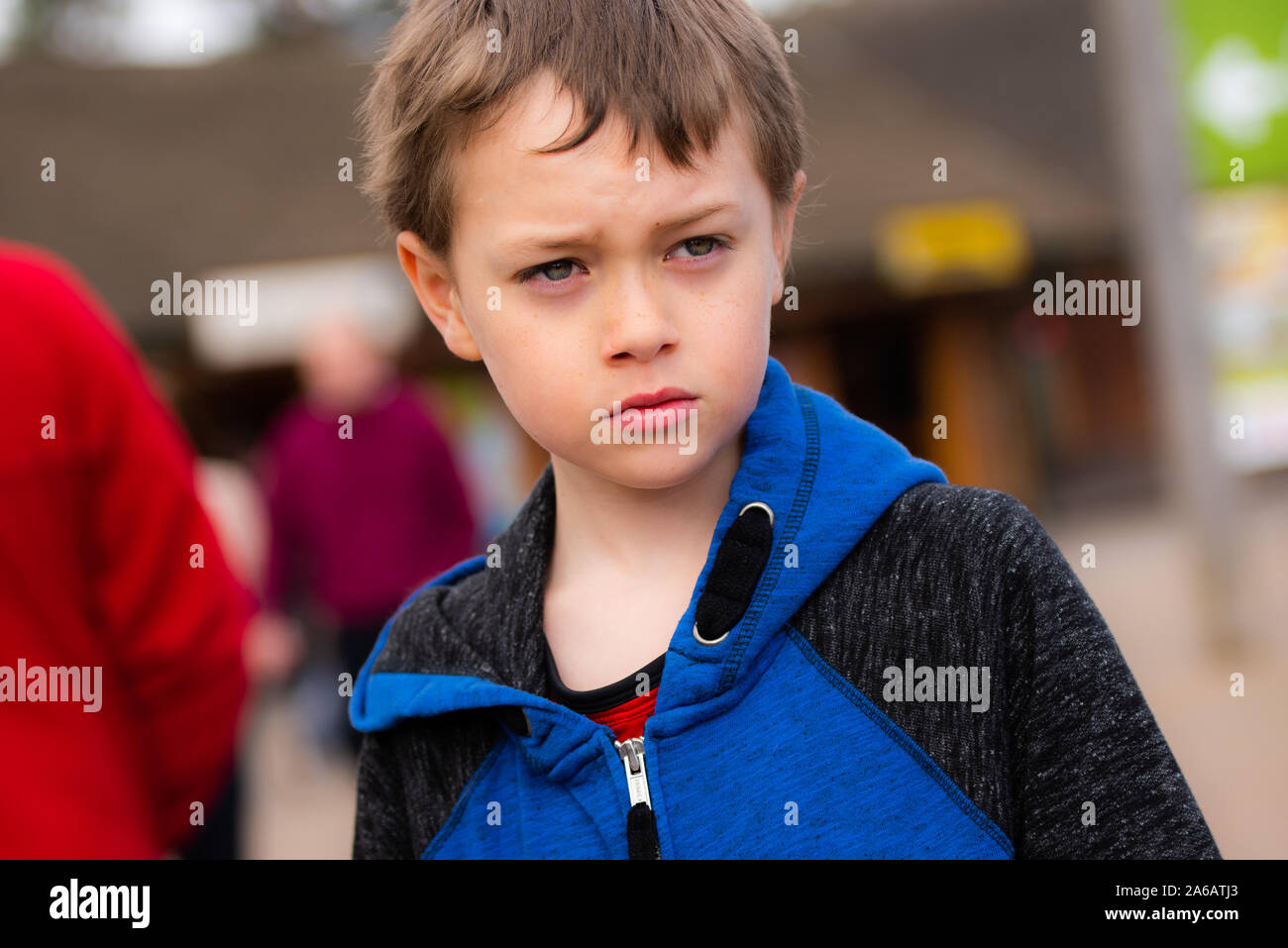 A little boy with ADHD, Autism, Aspergers syndrome enjoys playing with ...