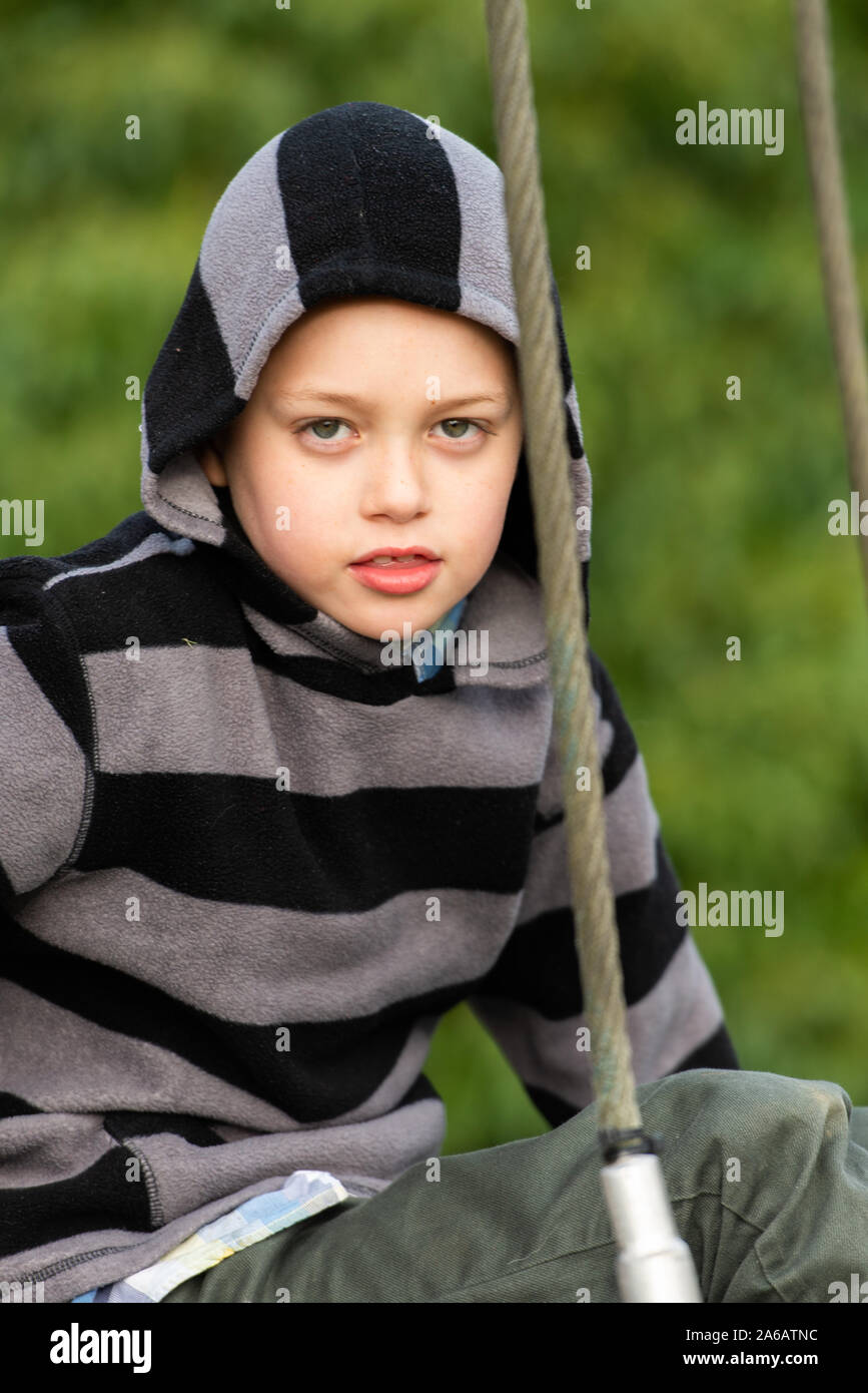 A little boy with ADHD, Autism, Aspergers Syndrome playing and posing ...