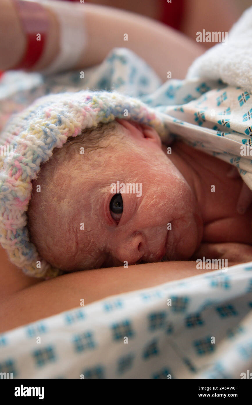 A young baby girl is born premature weighing just 4lbs, pictured here ...