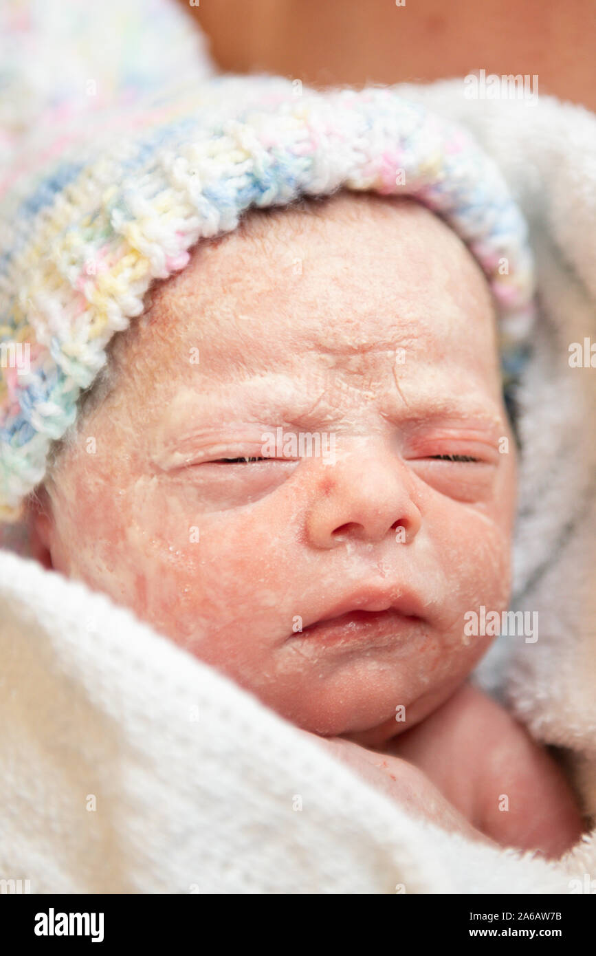 A young baby girl is born premature weighing just 4lbs, pictured here ...