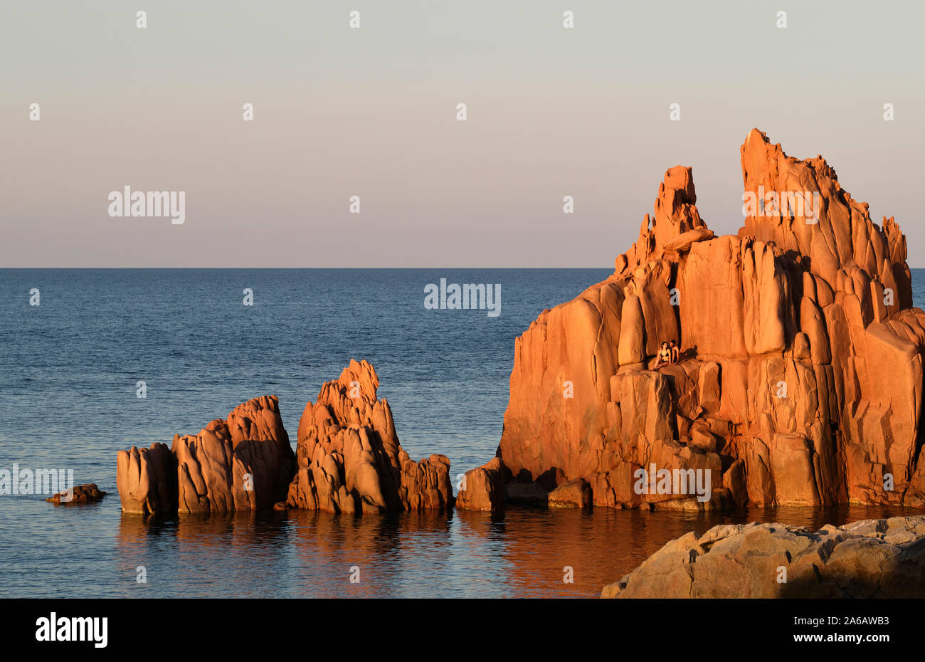 Tourists enjoying the Rocce rosse / Porphyry Red Rocks Beach Arbatax ...