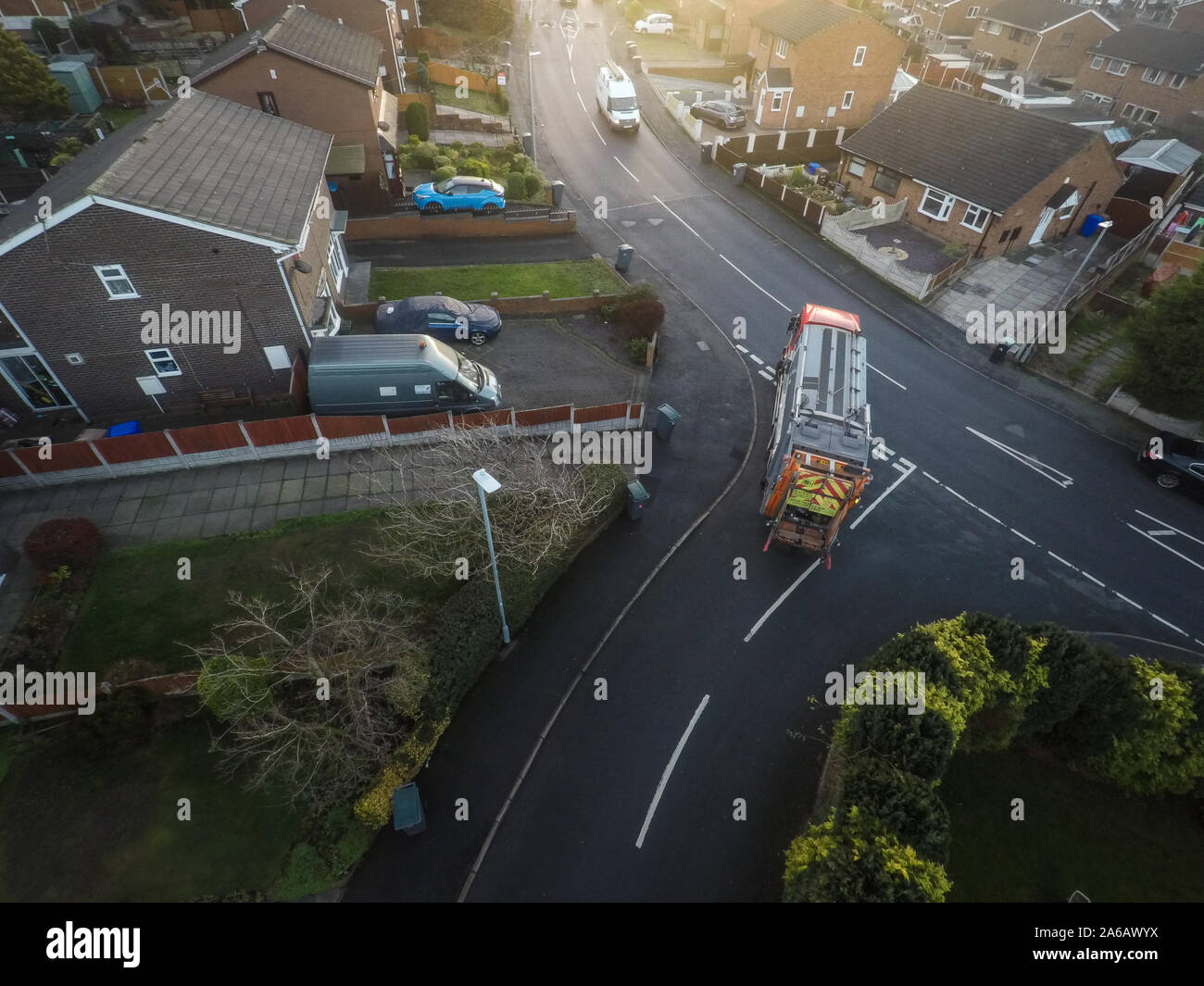 Aerial View of Dustmen putting recycling waste into a waste truck, Bin ...