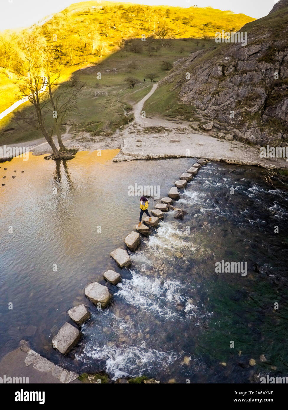 Aerial views of the stunning Dovedale stepping stones and mountains in ...
