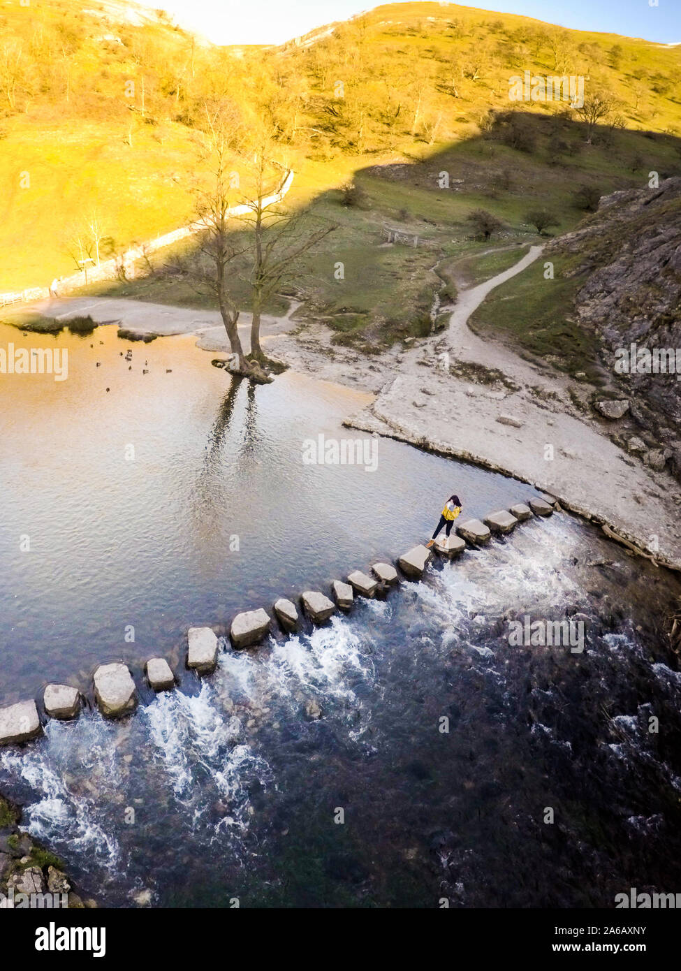 Aerial views of the stunning Dovedale stepping stones and mountains in ...