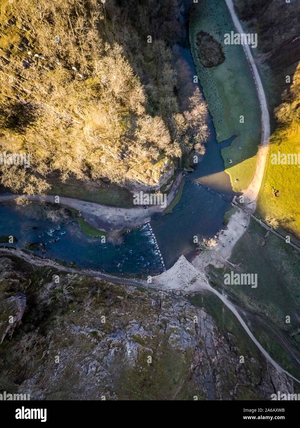 Aerial views of the stunning Dovedale stepping stones and mountains in ...