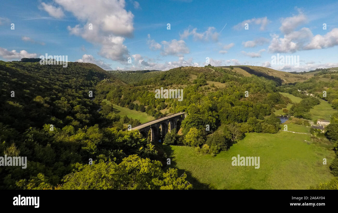 Stunning aerial view of headstone viaduct, railway bridge in the Peak ...