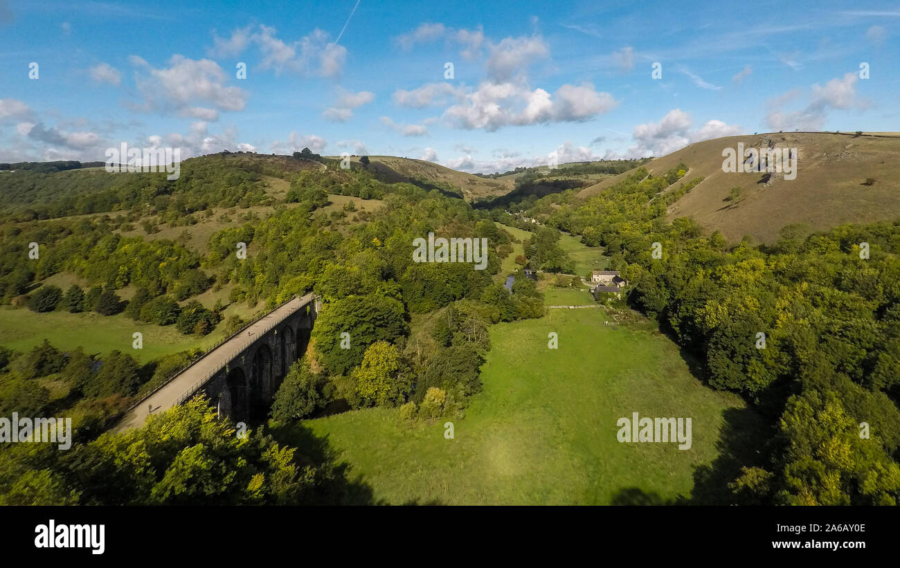 Stunning aerial view of headstone viaduct, railway bridge in the Peak ...