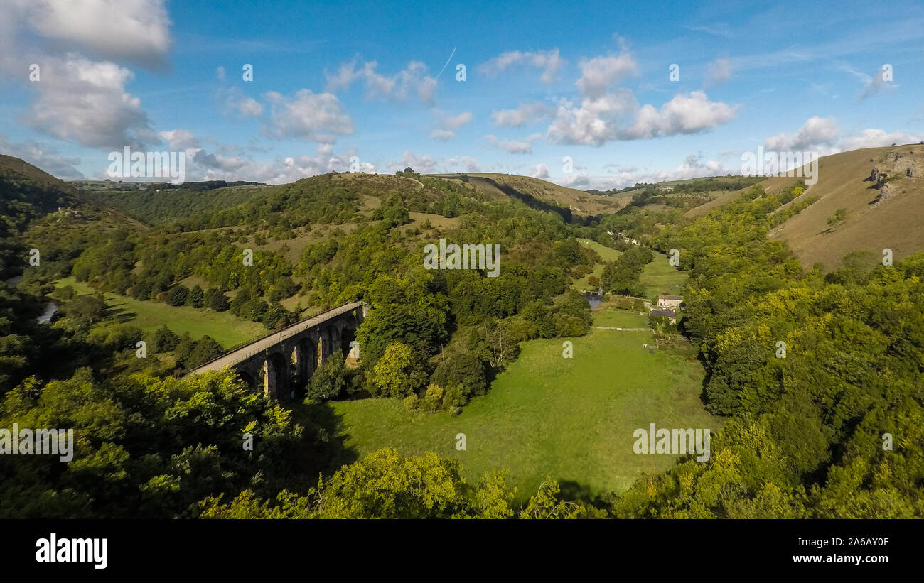 Stunning aerial view of headstone viaduct, railway bridge in the Peak ...