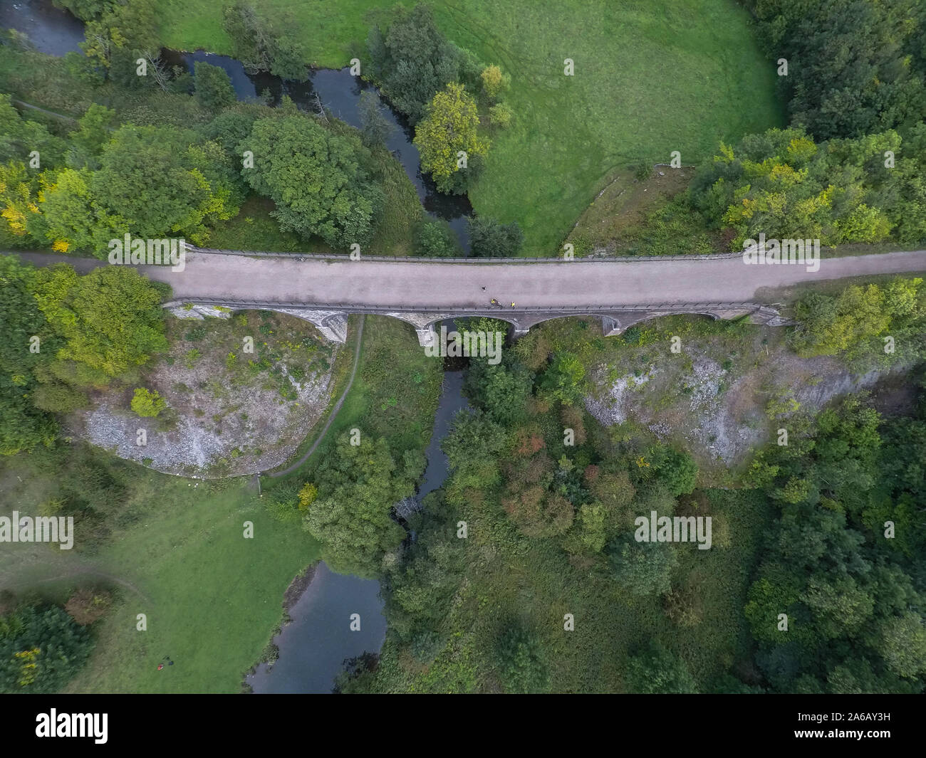 Stunning aerial view of headstone viaduct, railway bridge in the Peak ...