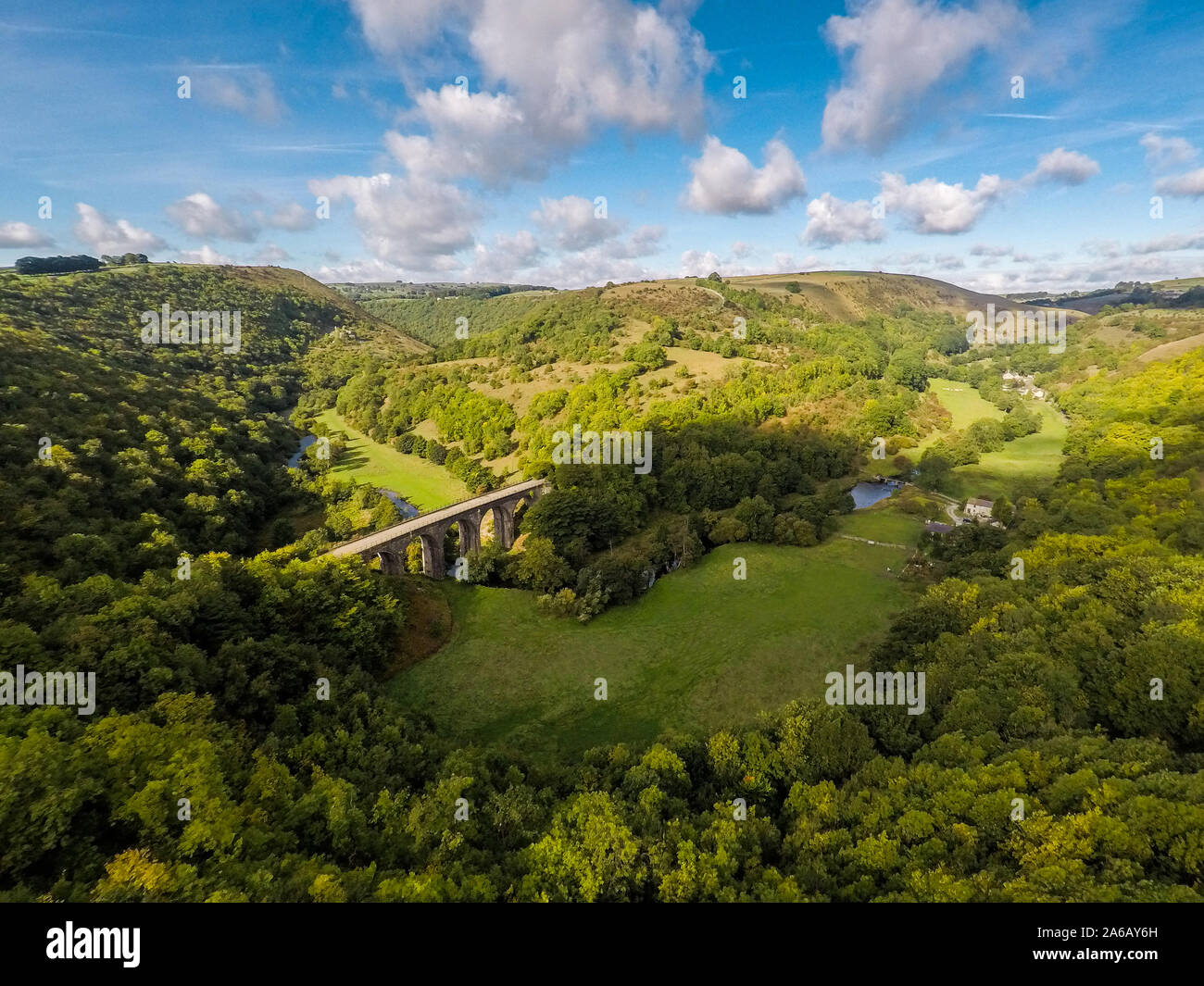 Stunning aerial view of headstone viaduct, railway bridge in the Peak ...