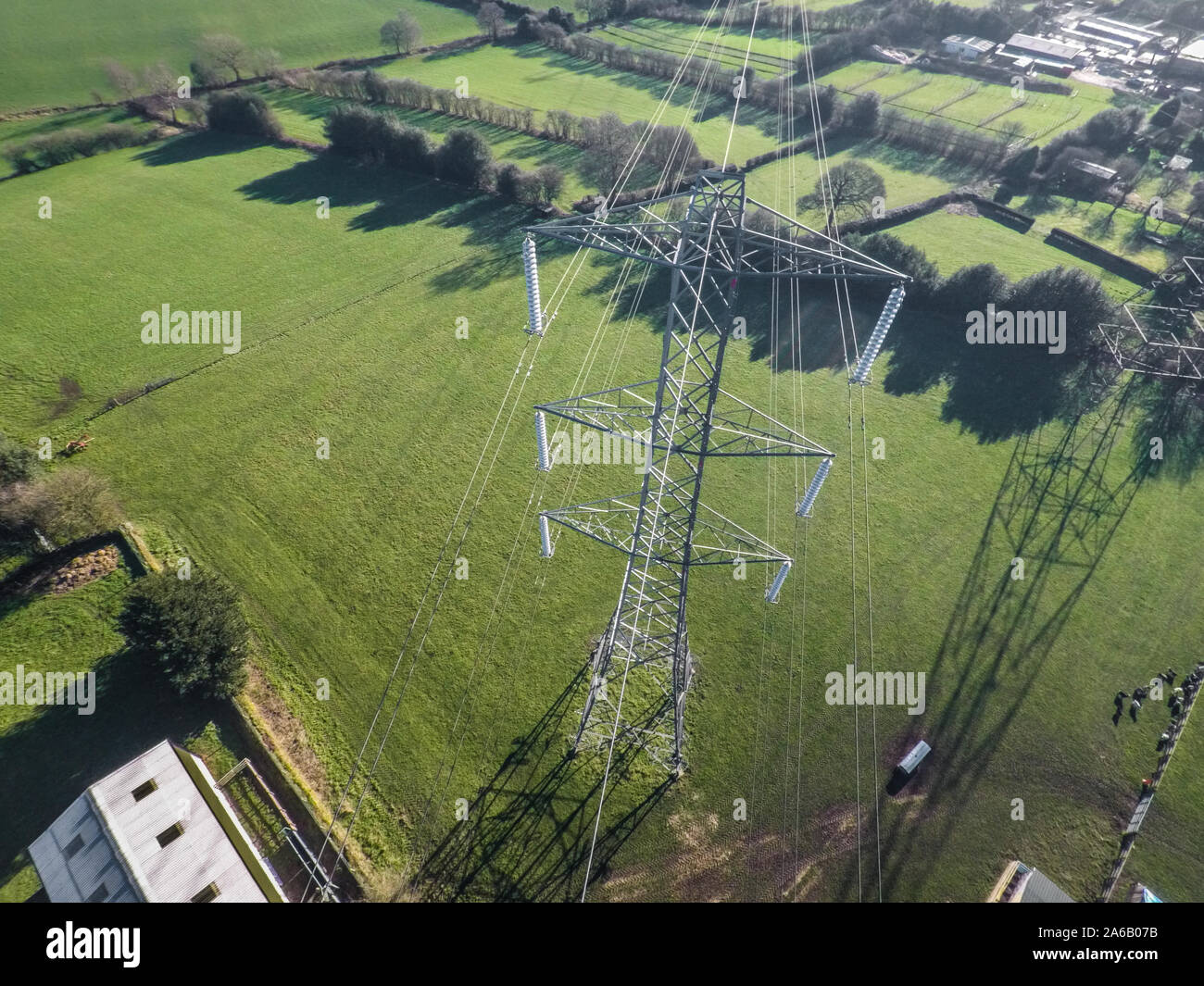 Aerial view of high voltage electric power lines, pylons, towers and in ...