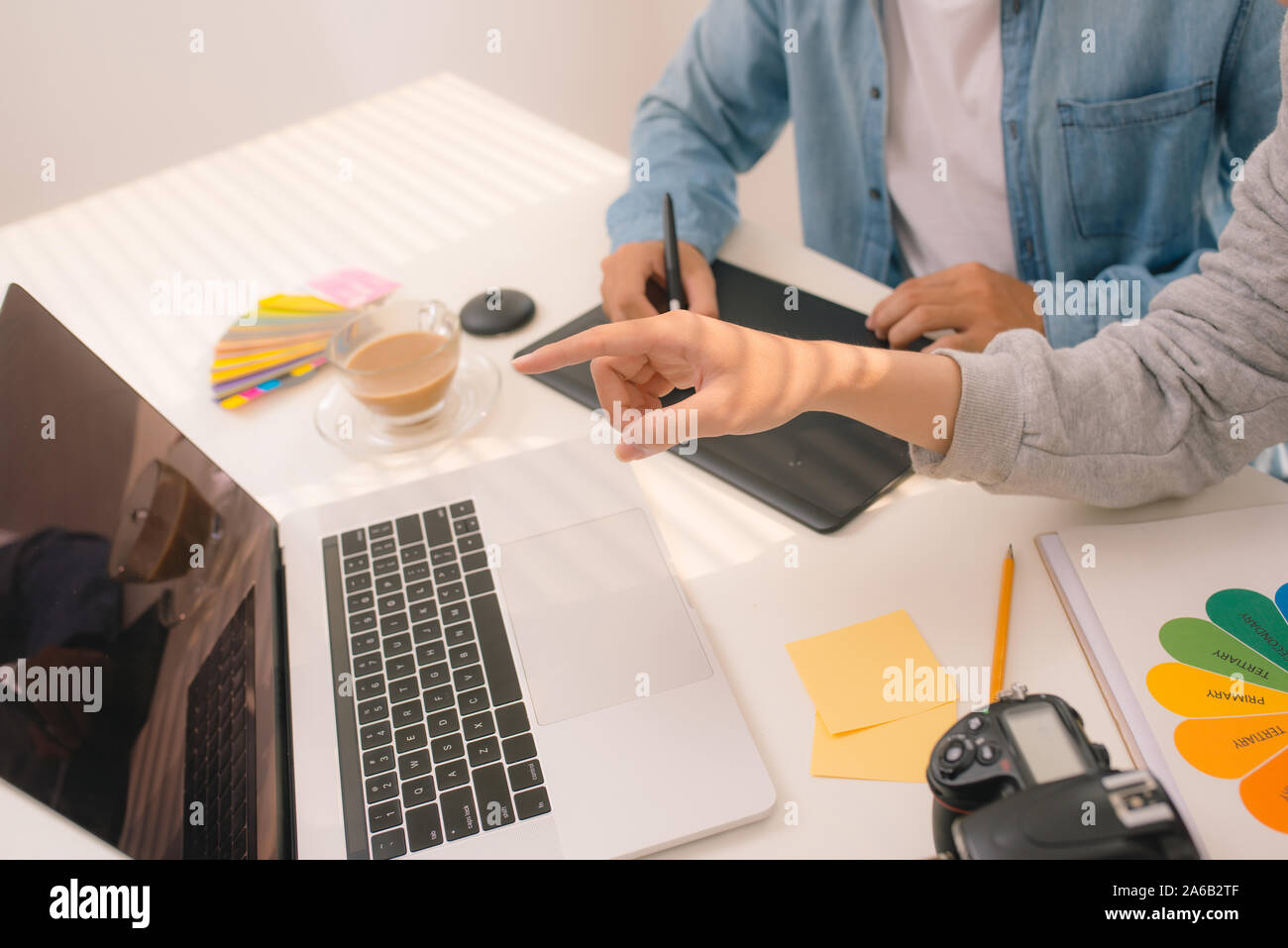 team Web designer working drawing something on graphic computer in the ...